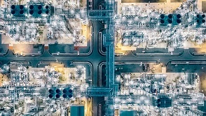 A number of cell tower nodes perched on top of a building indicating ...